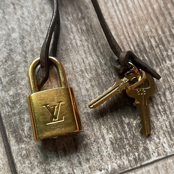Louis Vuitton | Accessories | Louis Vuitton Lock And Two Keys On A ...